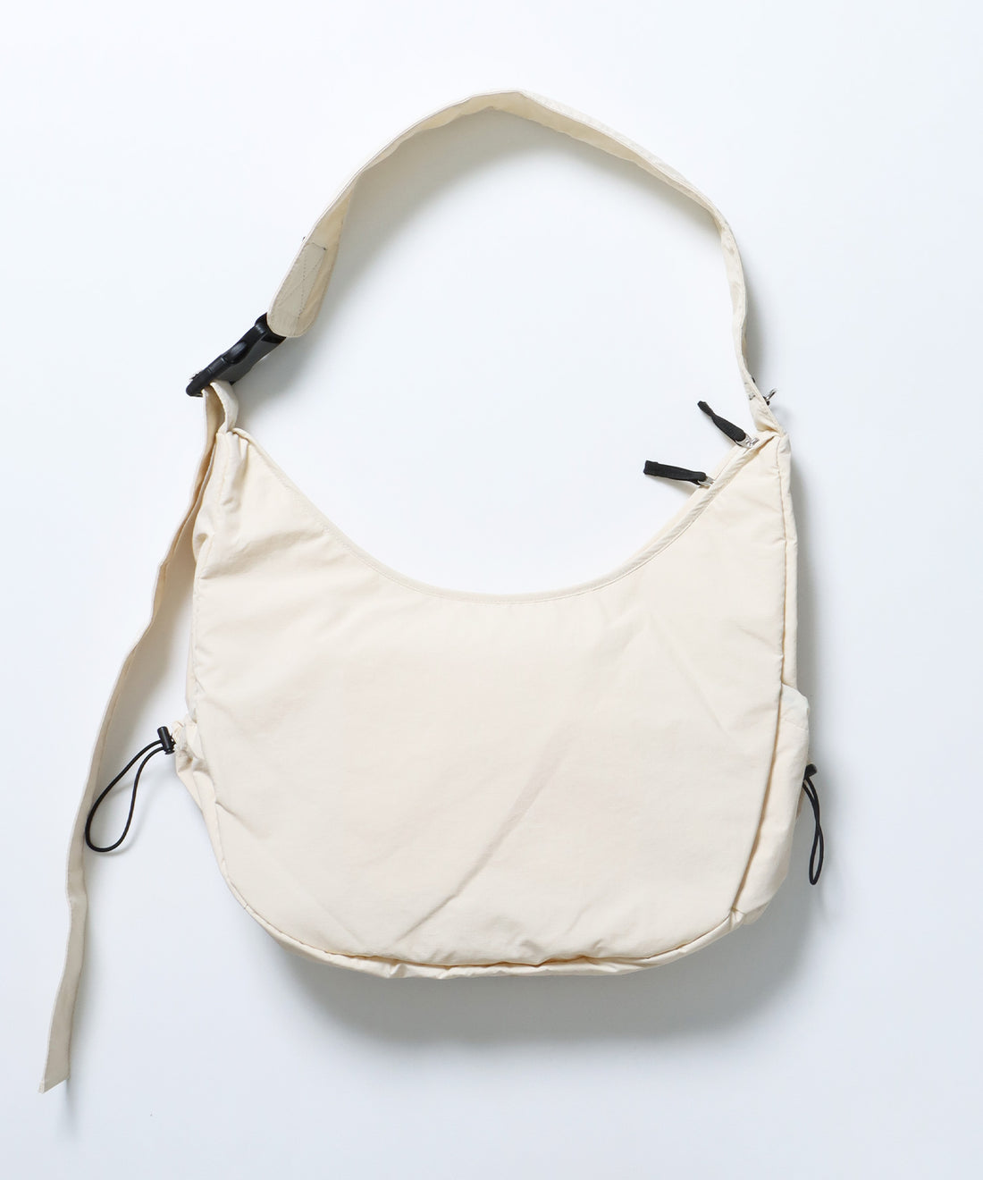 【SEQUENZ（シークエンズ）】TECH ROUND SHOULDER BAG / テック ショルダーバッグ 調節可能 ドローコード アイボリー – NAVAL Online Store